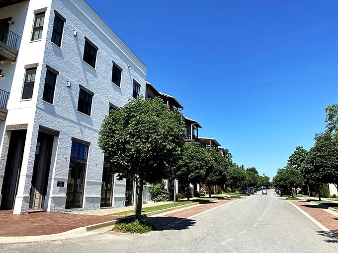 Modern meets small-town charm along these sidewalks, where brick pathways and shady trees make even a trip to check the mail feel like a European holiday.