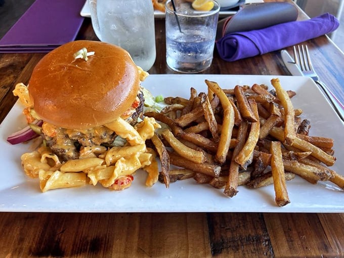 Forget your typical Nebraska burger joint—this creation comes dressed for Mardi Gras with crispy fries that could make a potato farmer weep with pride.