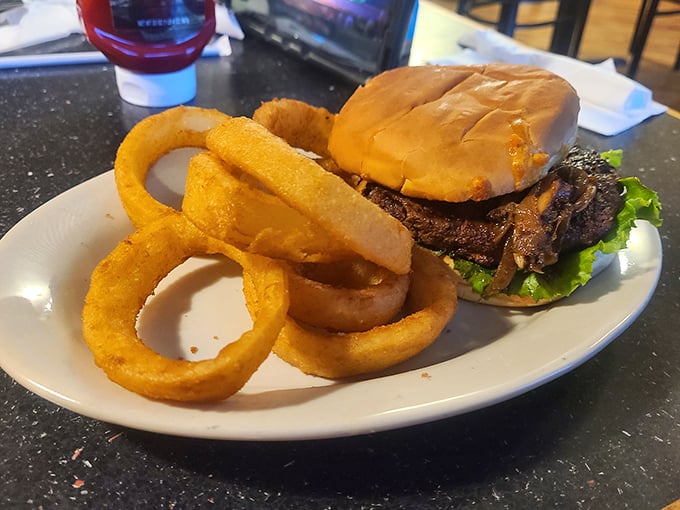 When a steakhouse makes a burger, they're playing with their strongest muscle. This hand-formed patty with golden onion rings is beef's greatest side hustle.