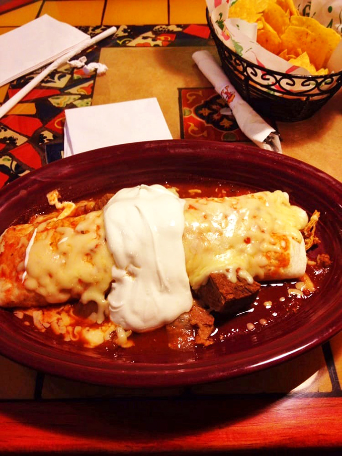 When a burrito gets dressed up for a night out, this is what it wears&mdash;a sour cream dollop and melted cheese tuxedo.