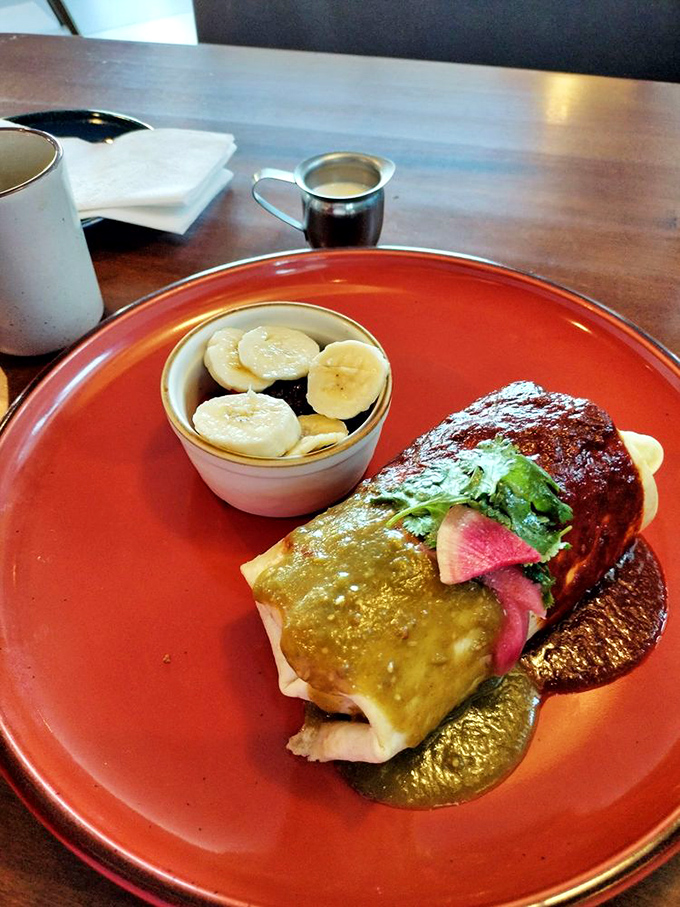 This isn't just a breakfast burrito&mdash;it's edible architecture wrapped in a tortilla, with that green sauce adding the perfect splash of morning excitement.