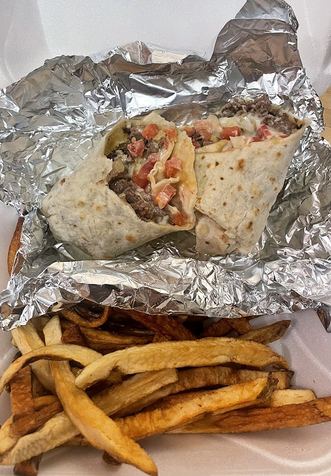 A burrito that could double as a pillow for a small child, wrapped in foil like the precious gift it is, accompanied by hand-cut fries.