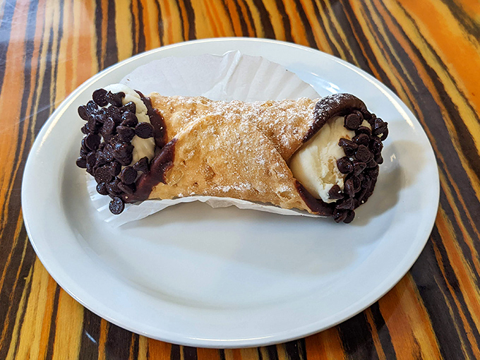 The cannoli &ndash; Sicily meets Virginia in perfect harmony. Those chocolate-dipped ends aren't just decoration; they're a commitment to excellence.