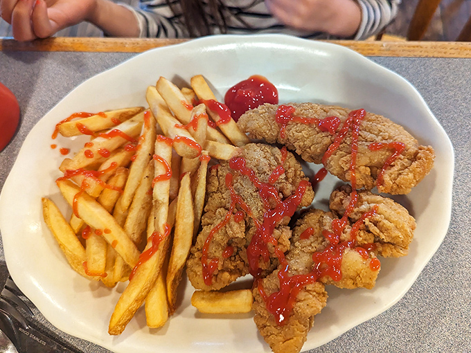 Who says breakfast places can't do lunch? These crispy chicken tenders with their ketchup drizzle are proof that Waterwheel plays the full culinary field.