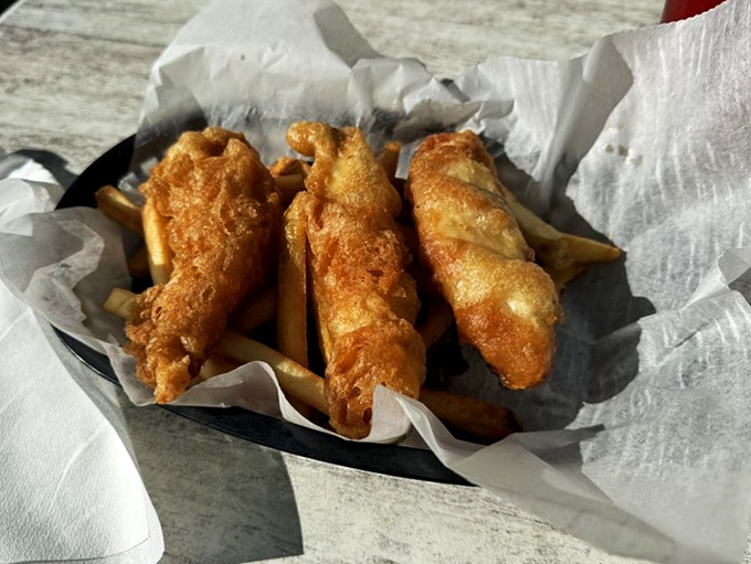 Golden-battered fish that makes you wonder why anyone would ever eat frozen fish sticks again. The crunch is practically musical.