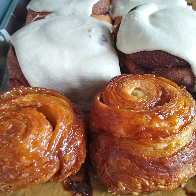 These cinnamon spirals and frosted buns aren't just breakfast—they're an argument against every "I'll just have fruit" morning decision ever made.
