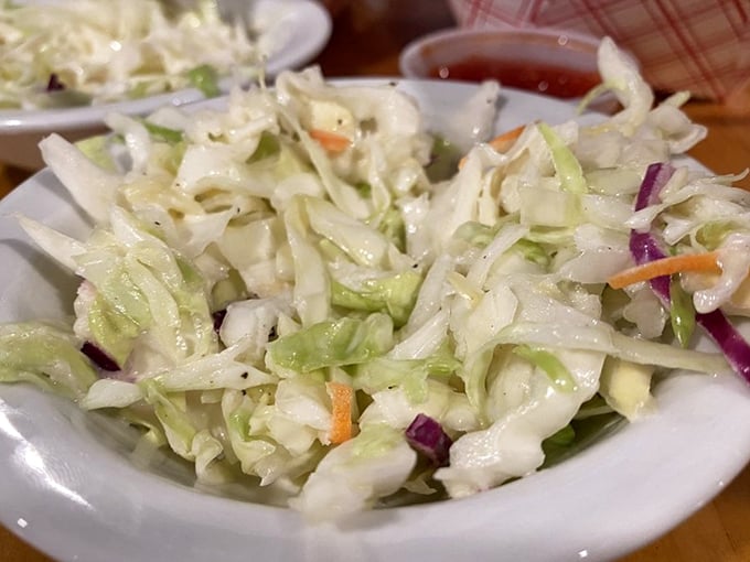 Coleslaw that knows its role &ndash; not too sweet, not too tangy, just the perfect cool counterpoint to all that glorious fried goodness.
