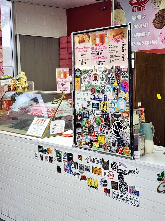 Sticker-covered counter culture – where every decal tells a story and the Thai iced tea rivals anything you'd find in Bangkok.