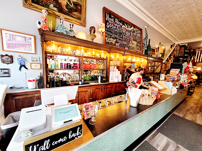 Behind that gleaming counter, soda jerks perform their sweet alchemy, transforming simple ingredients into the kind of treats that make you forget about your smartphone for a while.