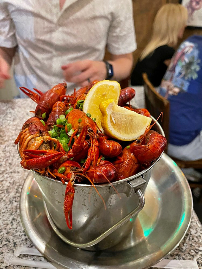 Bucket list item: Demolishing a pail of bright red crawfish while pretending you've known how to eat them properly your entire life.