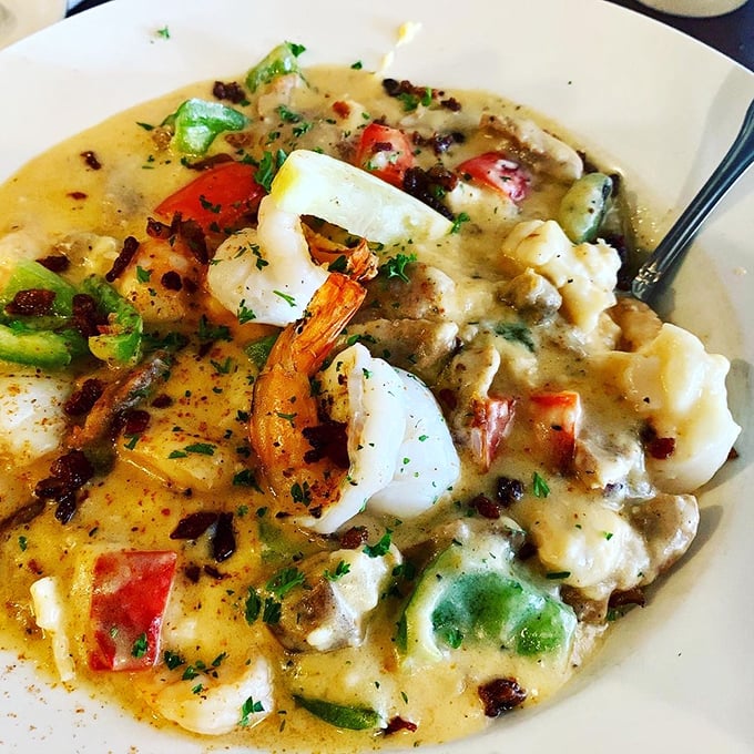 Fresh shrimp, crispy bacon bits, and vibrant peppers transform humble grits into something magical. This dish doesn't just satisfy hunger &ndash; it creates food memories.