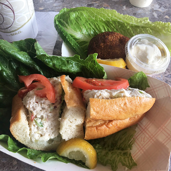 That moment when your fork breaks through the crispy exterior to reveal the sweet crab treasure within &ndash; culinary poetry.