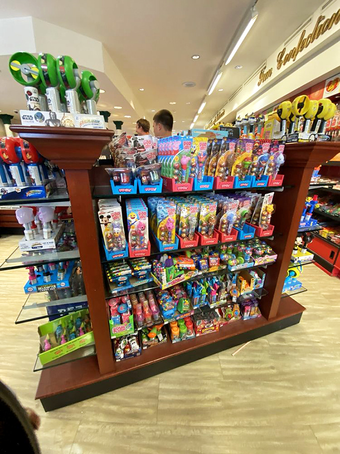 This isn't just a display&mdash;it's a shrine to childhood joy where POP figurines and nostalgic candy combine for maximum impulse-purchase power.