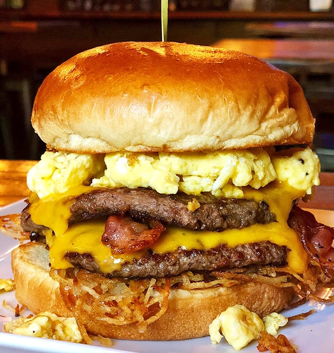 Breakfast meets lunch in this egg-topped behemoth. It's not just a burger; it's brunch with attitude and hash browns for good measure.