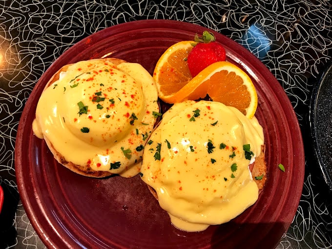 Eggs Benedict: where hollandaise sauce flows like liquid gold over perfectly poached eggs. The breakfast equivalent of wearing a tuxedo.