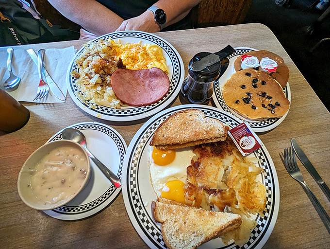 A breakfast spread that would make Ron Swanson weep with joy. When multiple plates arrive, you know you've found your people.