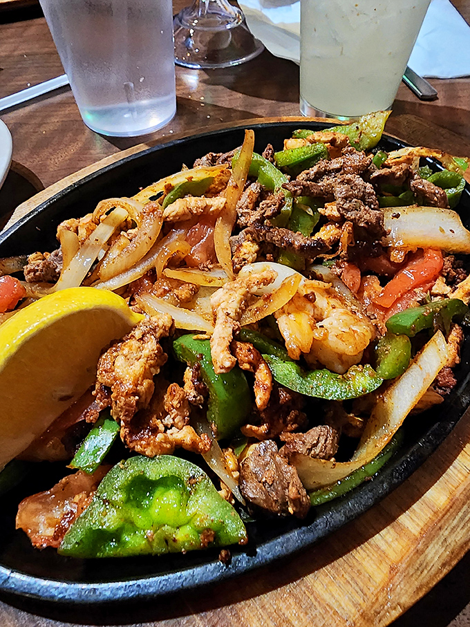 Sizzling fajitas that announce their arrival before you see them&mdash;like a delicious parade that ends at your table.
