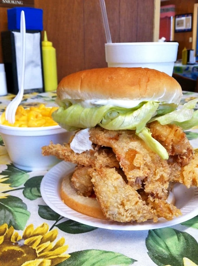 This isn't just a sandwich&mdash;it's an engineering marvel of crispy fish, fresh lettuce, and soft bun that requires both hands and several napkins.