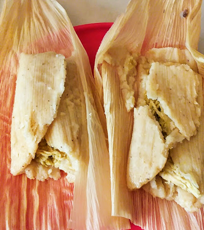 The to-go container might be humble, but what's inside is culinary royalty &ndash; tamales served with those essential little cups of salsa that pack more flavor than their size suggests.