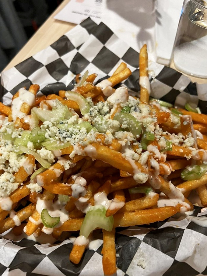These aren't just fries&mdash;they're a blue cheese celebration with green onions playing backup to the crispy, golden main act.