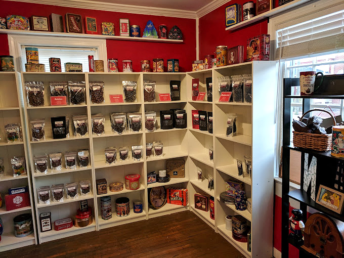 Chocolate-covered strawberries nestled in their box like rubies in a jewelry case. Valentine's Day heroes are made here, one berry at a time.