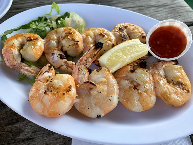 Plump, perfectly grilled shrimp that taste like they jumped from ocean to plate. Simple, unfussy seafood that lets quality speak for itself.