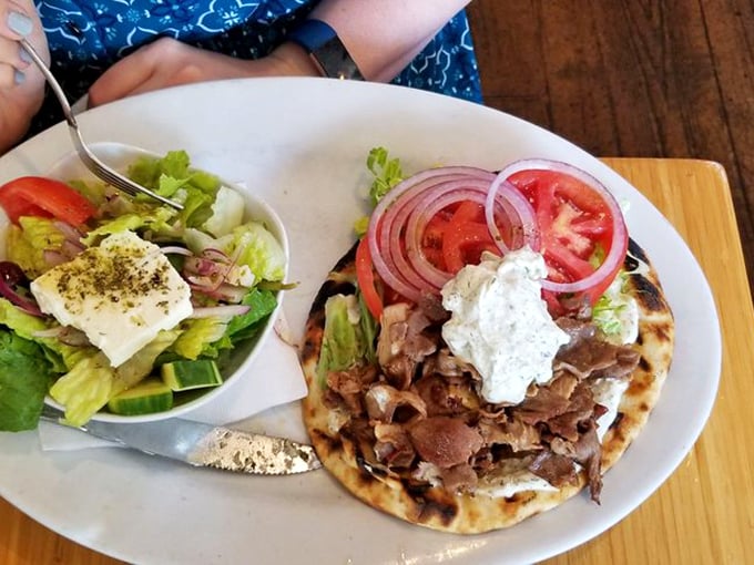 The perfect bite: tender gyro meat meets garden-fresh salad. It's like the Mediterranean diet decided to have a party and everyone's invited.