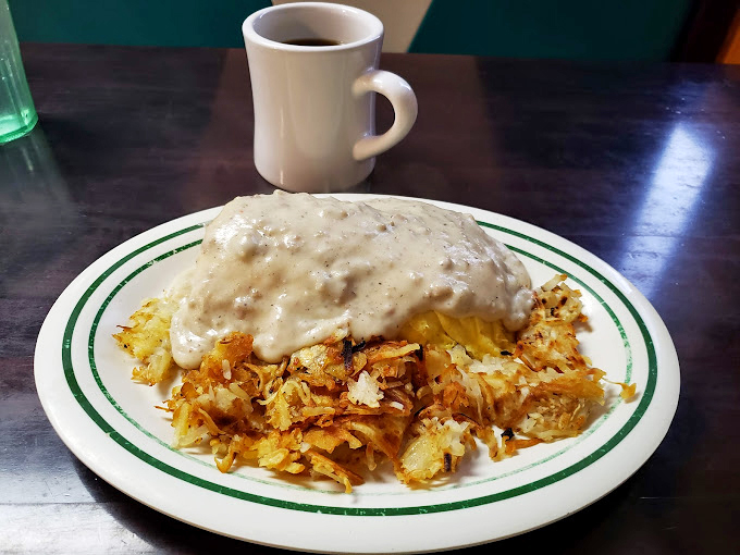 Gravy-smothered hash browns that could make a cardiologist nervous but are worth every delicious, artery-challenging bite.