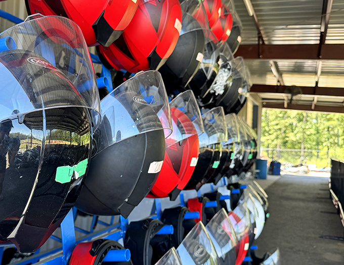 Helmet heaven! Choose your racing identity from this colorful wall of safety. Remember, the red ones don't actually make you go faster.