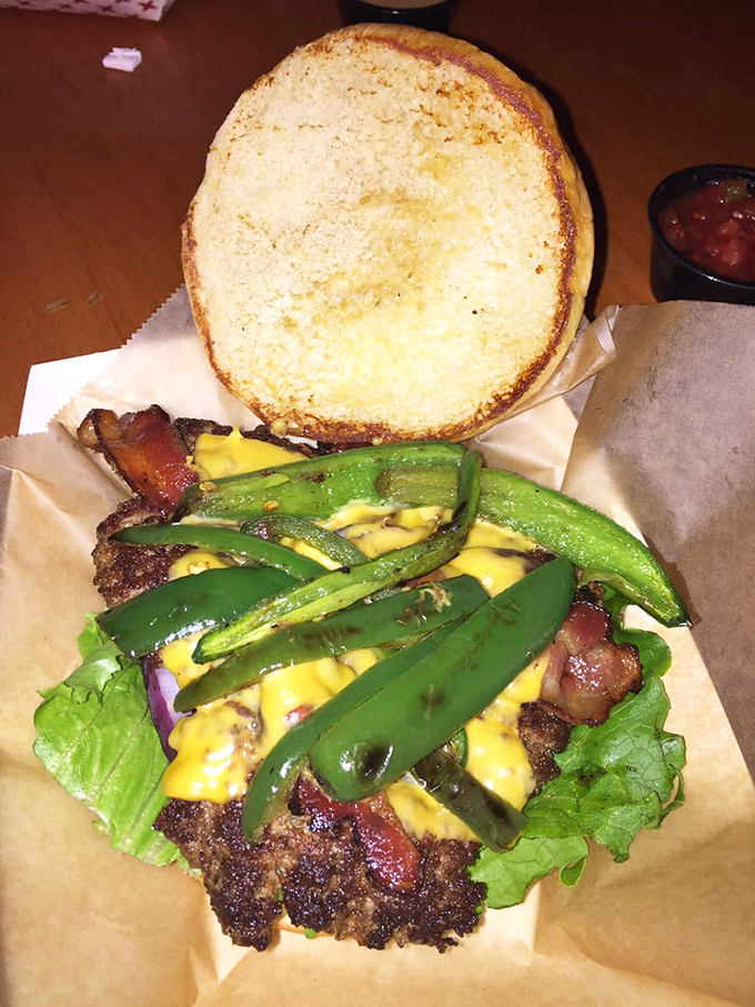 Green jalape&ntilde;os pop against melted cheese like edible fireworks. This burger doesn't just satisfy hunger &ndash; it creates memories.