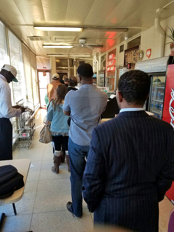 The line forms early at this Shreveport institution, where strangers become comrades united in the pursuit of fried perfection.
