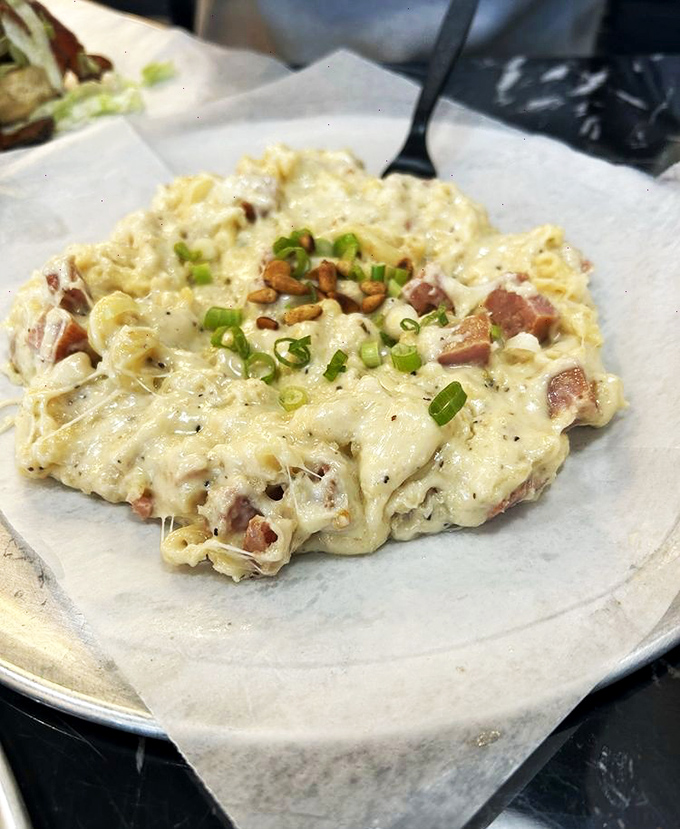 Mac and cheese that doesn't come from a blue box, but from burger heaven&mdash;with chunks of ham and green onions playing the role of flavor angels.