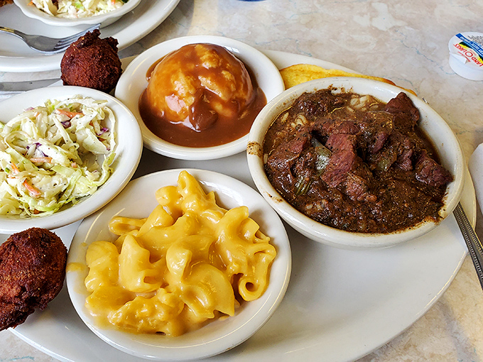 Mac and cheese so gloriously yellow it could guide ships to shore. Comfort food that wraps around your soul like your favorite childhood memory.