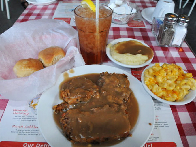 Meatloaf swimming in gravy alongside mac and cheese that would make your grandmother both proud and jealous. This is therapy without the hourly rate.