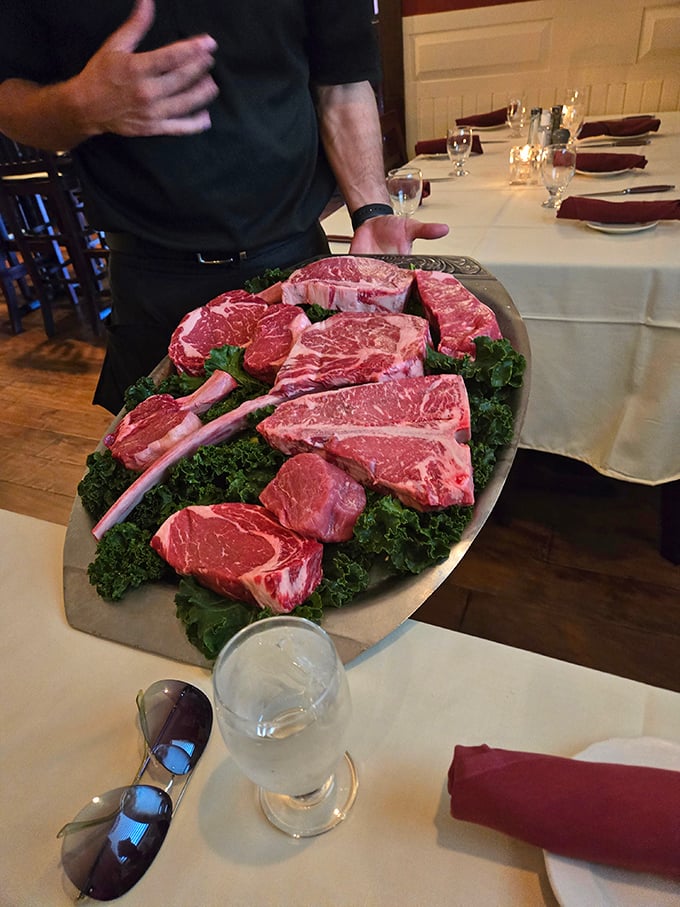 The meat selection presentation is what I imagine heaven's welcome wagon looks like &ndash; a parade of marbled masterpieces atop a bed of kale, awaiting their delicious destiny.