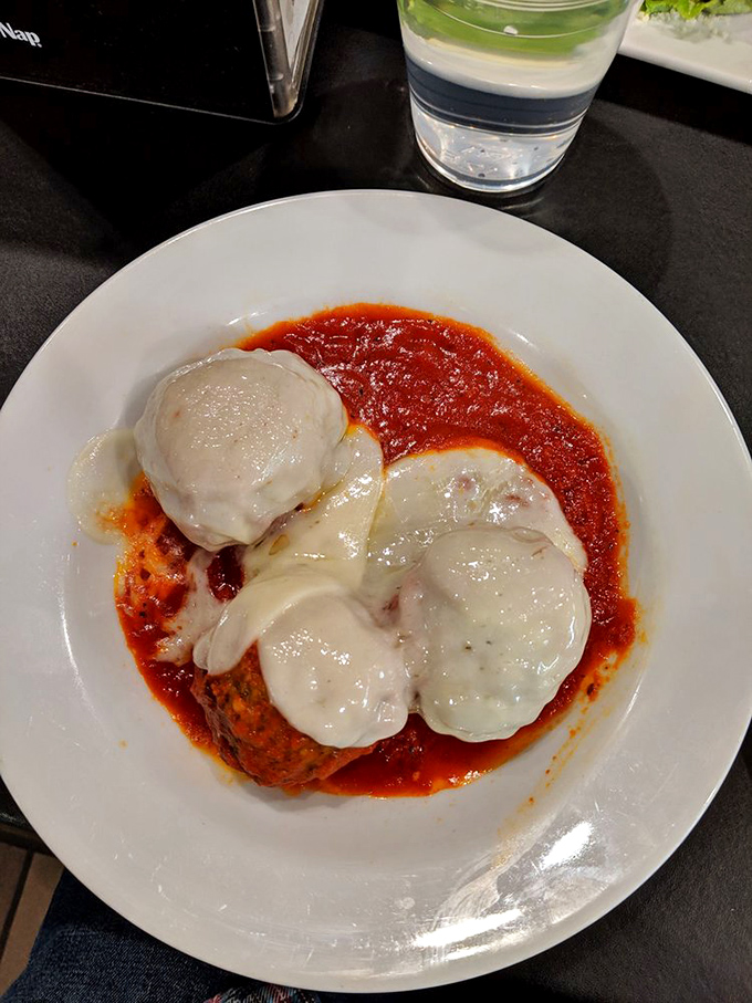 These meatballs aren't just swimming in sauce&mdash;they're doing the backstroke in a pool of flavor that would make Nonna weep with pride.