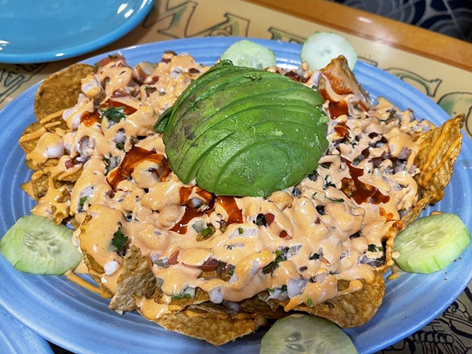 Seafood nachos crowned with a perfect avocado half&mdash;like Neptune himself designed a snack for desert dwellers.