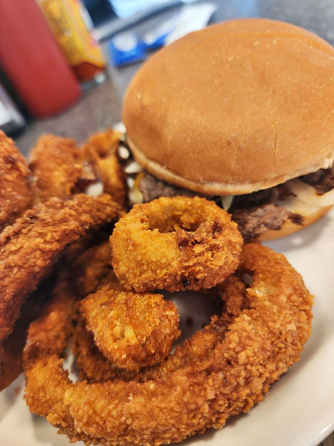Golden onion rings with the structural integrity to support your burger dreams. Architecture you can eat&mdash;Frank Lloyd Wright would approve.