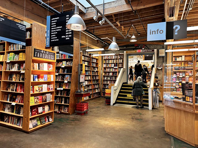 Overhead signs guide literary explorers through Powell's book wilderness, though getting delightfully sidetracked is practically guaranteed&mdash;and highly recommended.