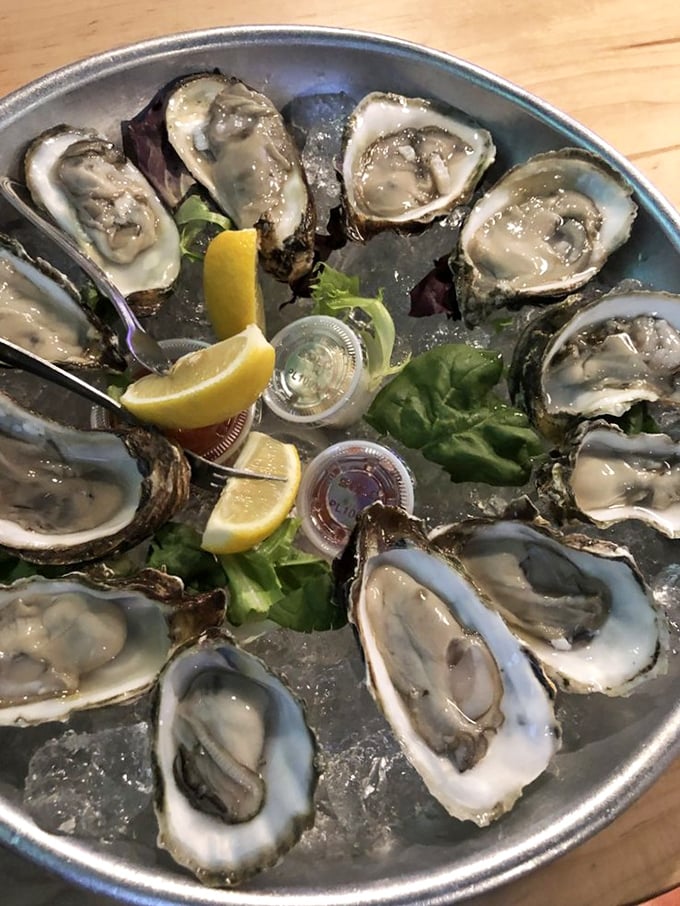 These oysters aren't just fresh; they're having a spa day on ice with lemon wedges as their personal attendants.