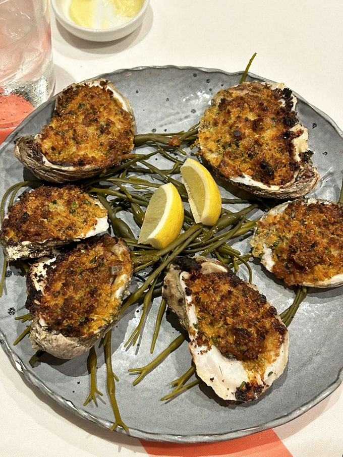 These baked oysters arrive looking like they've dressed for the opera&mdash;crispy, golden-brown tops hiding briny treasures beneath.