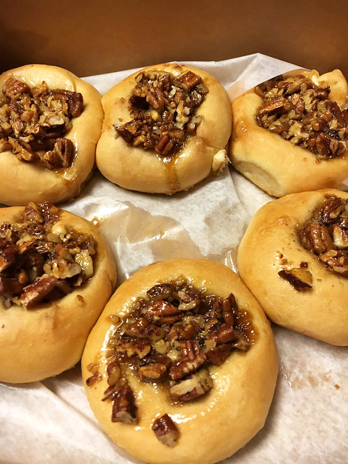 Pecan-topped kolaches that look like they should be behind glass at a museum of breakfast art. The glistening caramel is practically winking at you.