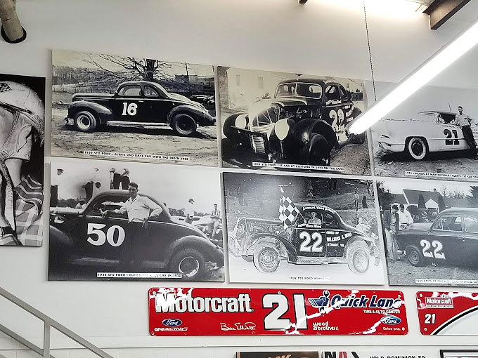 Black and white memories line the walls&mdash;each vintage photo a chapter in the Wood Brothers' remarkable journey from dirt tracks to NASCAR royalty.