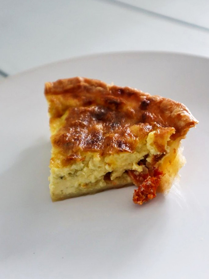 This savory quiche slice proves that pie doesn't always need to wear dessert clothes to be the belle of the brunch ball.
