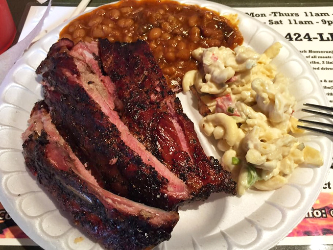 These ribs don't just fall off the bone&mdash;they practically leap into your mouth. The smoke ring is so perfect it could be framed in a museum.
