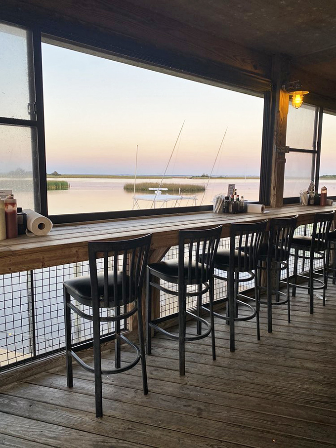 Sunset bar seating that turns happy hour into a religious experience. The view alone is worth the price of admission.