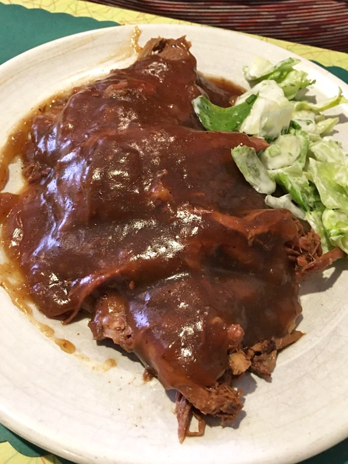 Slow-cooked roast beef swimming in rich brown gravy&mdash;the kind of plate that makes you want to call your cardiologist just to brag.