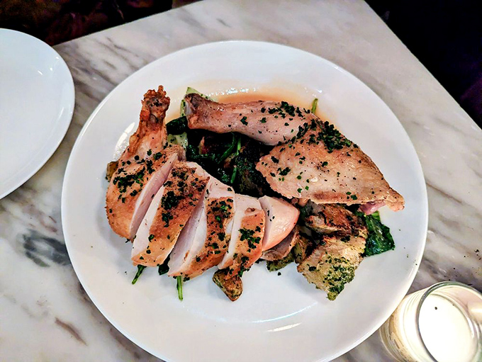 Perfectly roasted chicken, sliced and ready for its close-up. The kind of dish that makes you wonder why you ever eat anything else.