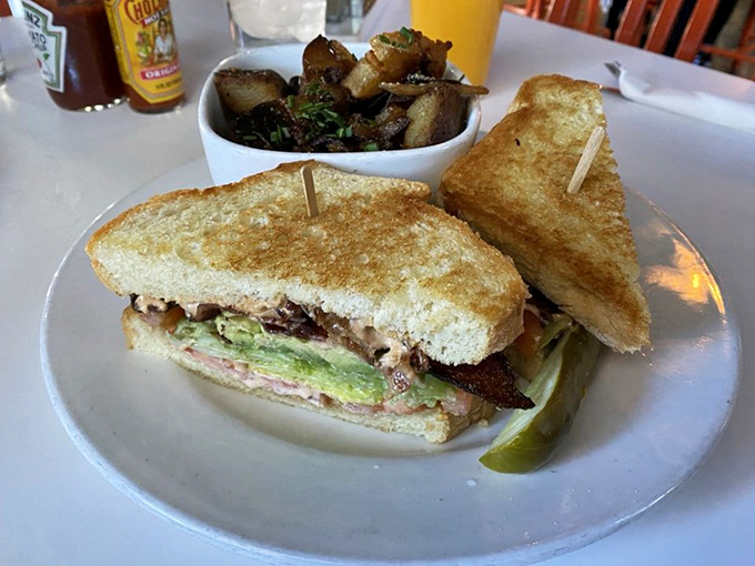 A sandwich that doesn't need to shout about its brilliance. Those saut&eacute;ed mushrooms on the side aren't a garnish&mdash;they're a supporting actor worthy of their own award.