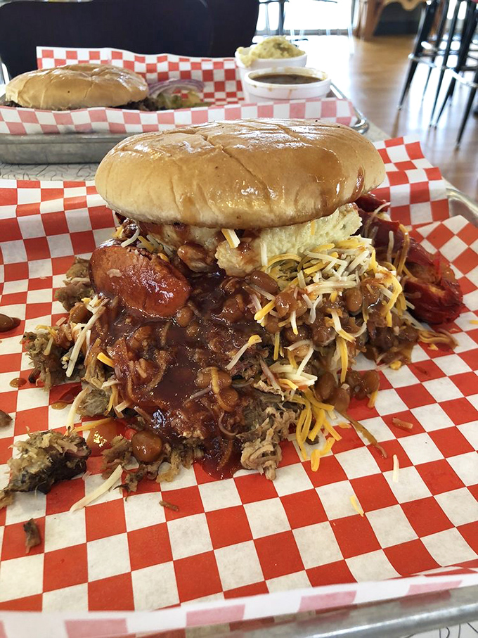 A sandwich that requires both hands and a strategy. This architectural marvel of meat, beans, and cheese makes skyscrapers look structurally simple.